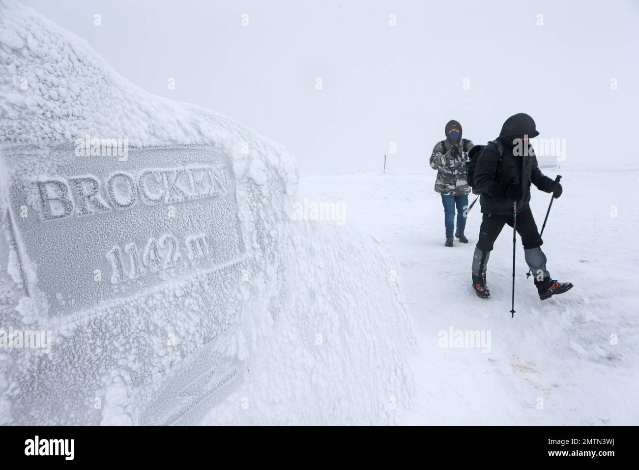 Schierke, Germany. 01st Feb, 2023. Hikers walk along the Brocken in the ...