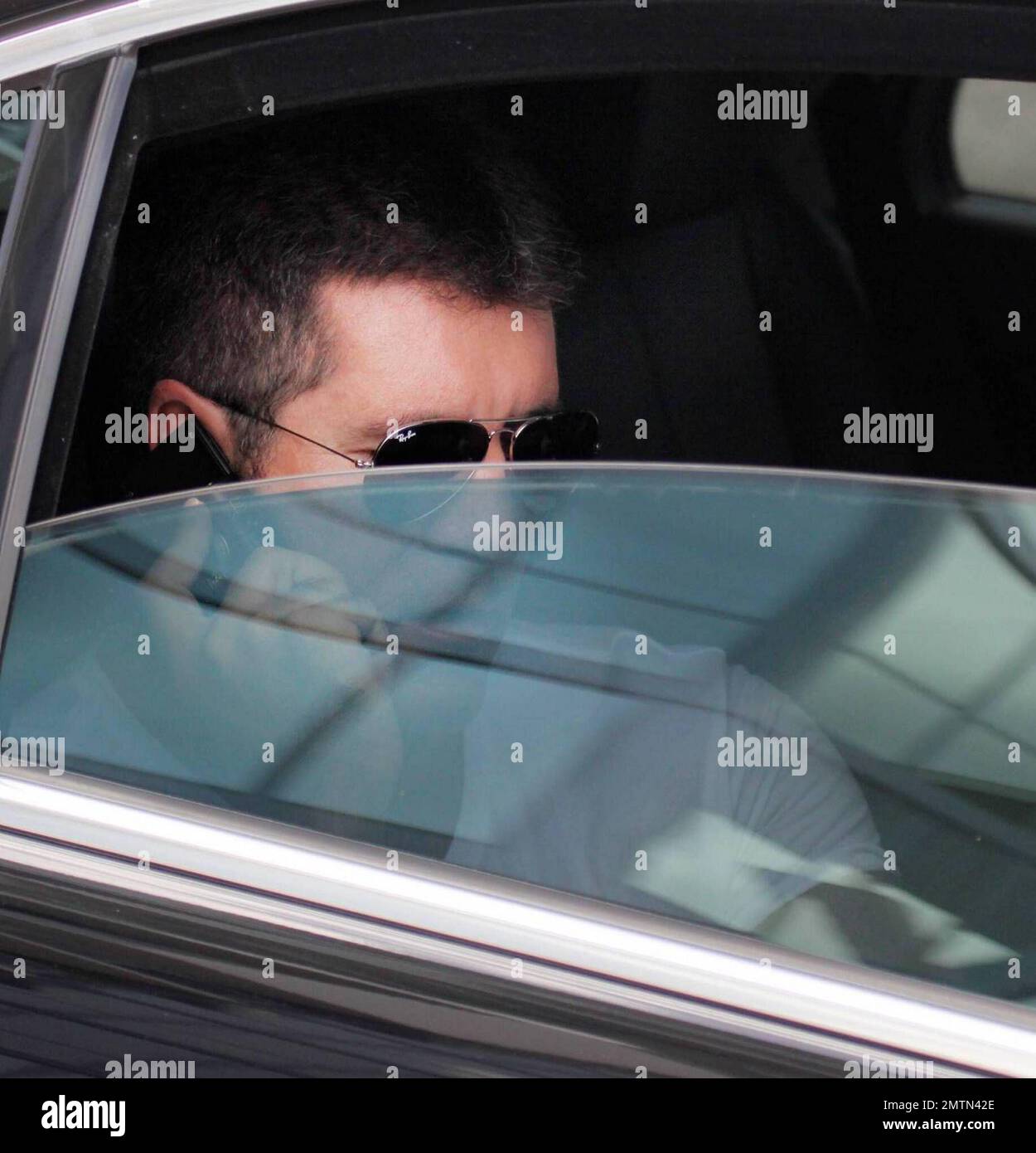 EXCLUSIVE!! Simon Cowell goes bananas! The American Idol judge grabbed ...