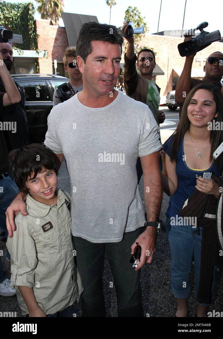 Simon Cowell is an American Idol. His fans crowded around him today as ...