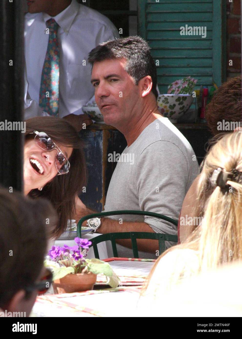 Simon Cowell is an American Idol. His fans crowded around him today as ...