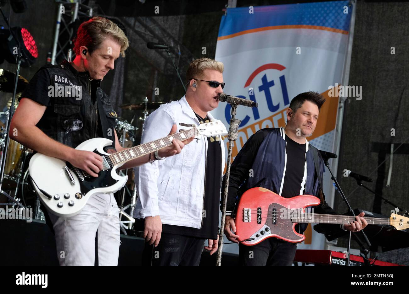 Rascal Flatts band members, from left, Joe Don Rooney, Gary LeVox and ...
