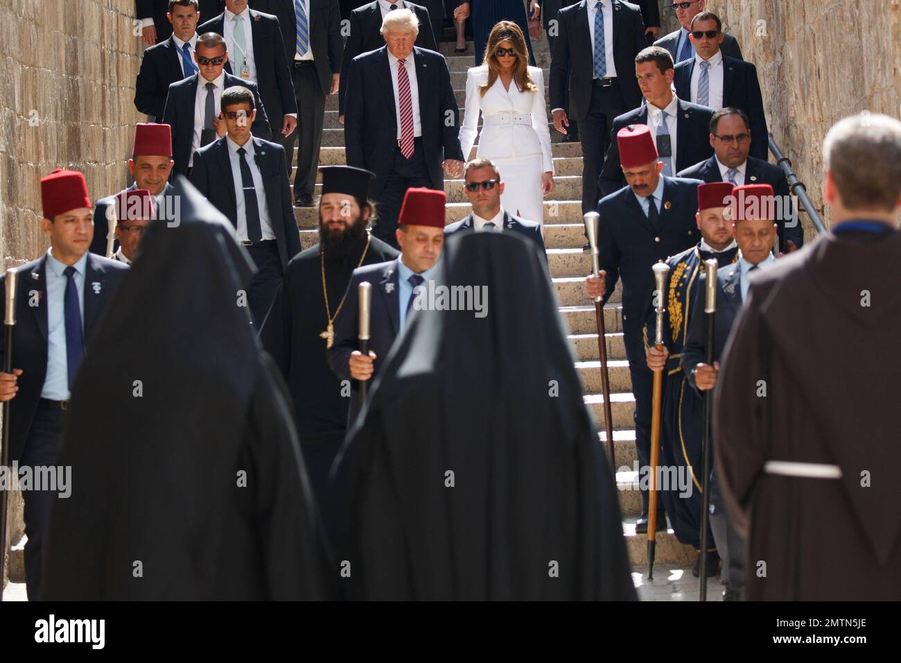 President Donald Trump and first lady Melania Trump walk to the Church ...