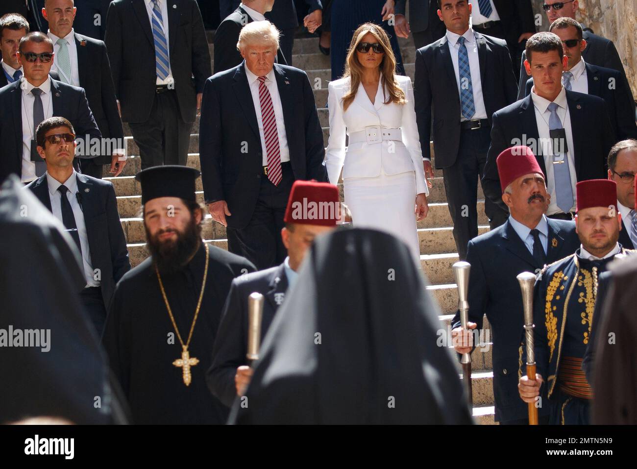President Donald Trump and first lady Melania Trump walk to the Church ...