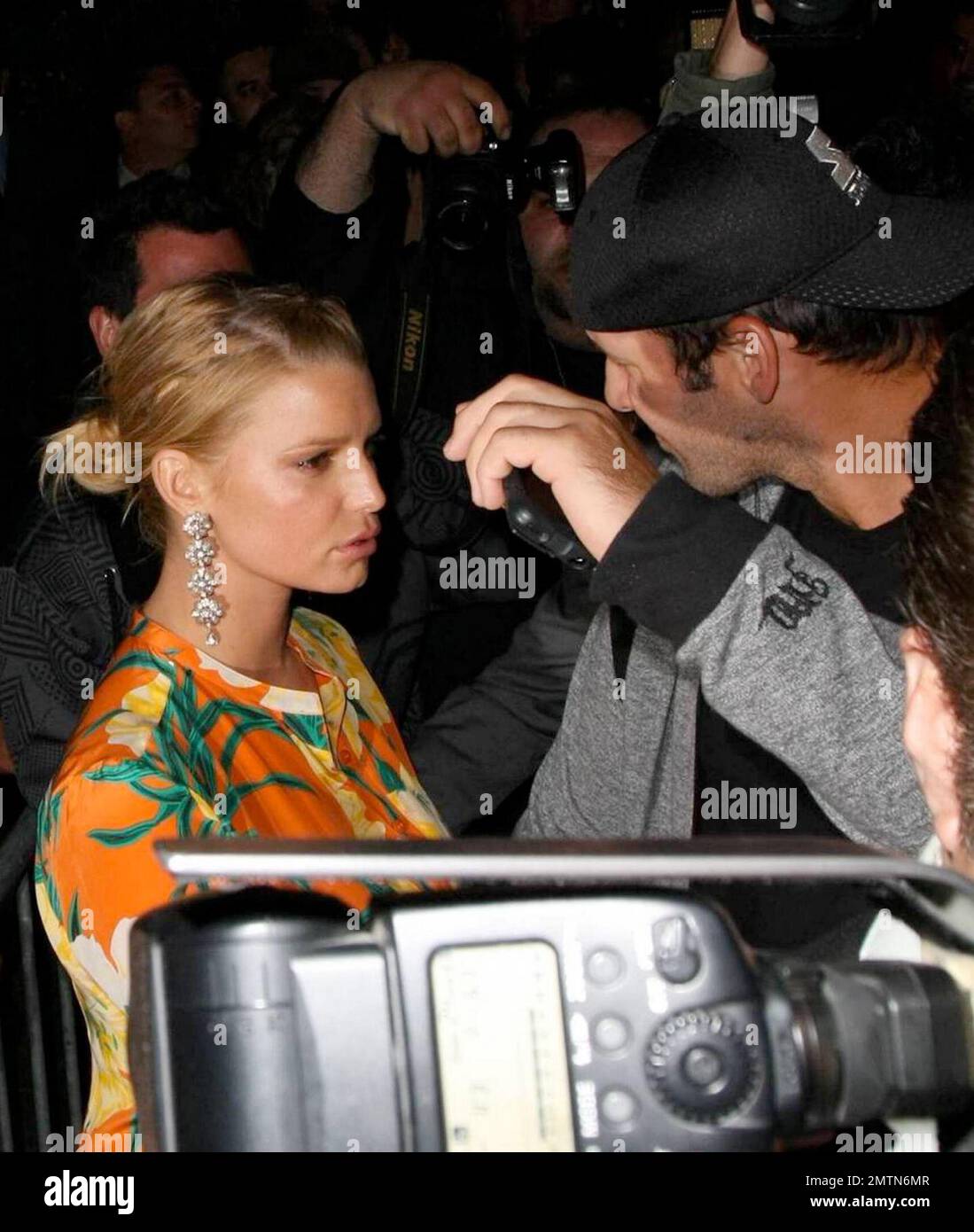 Jessica Simpson and boyfriend Tony Romo are joined by sister Ashlee ...