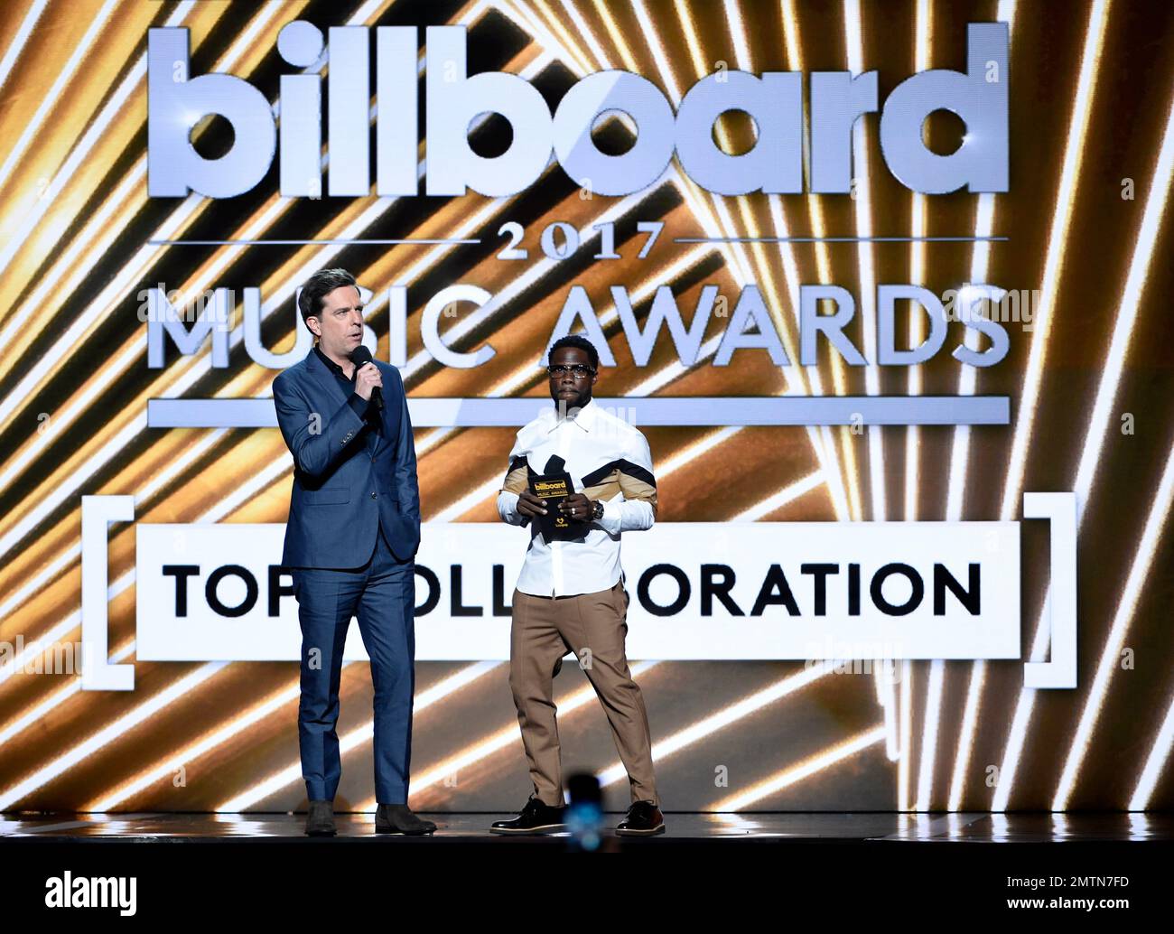 Ed Helms, left, and Kevin Hart present the award for top collaboration ...