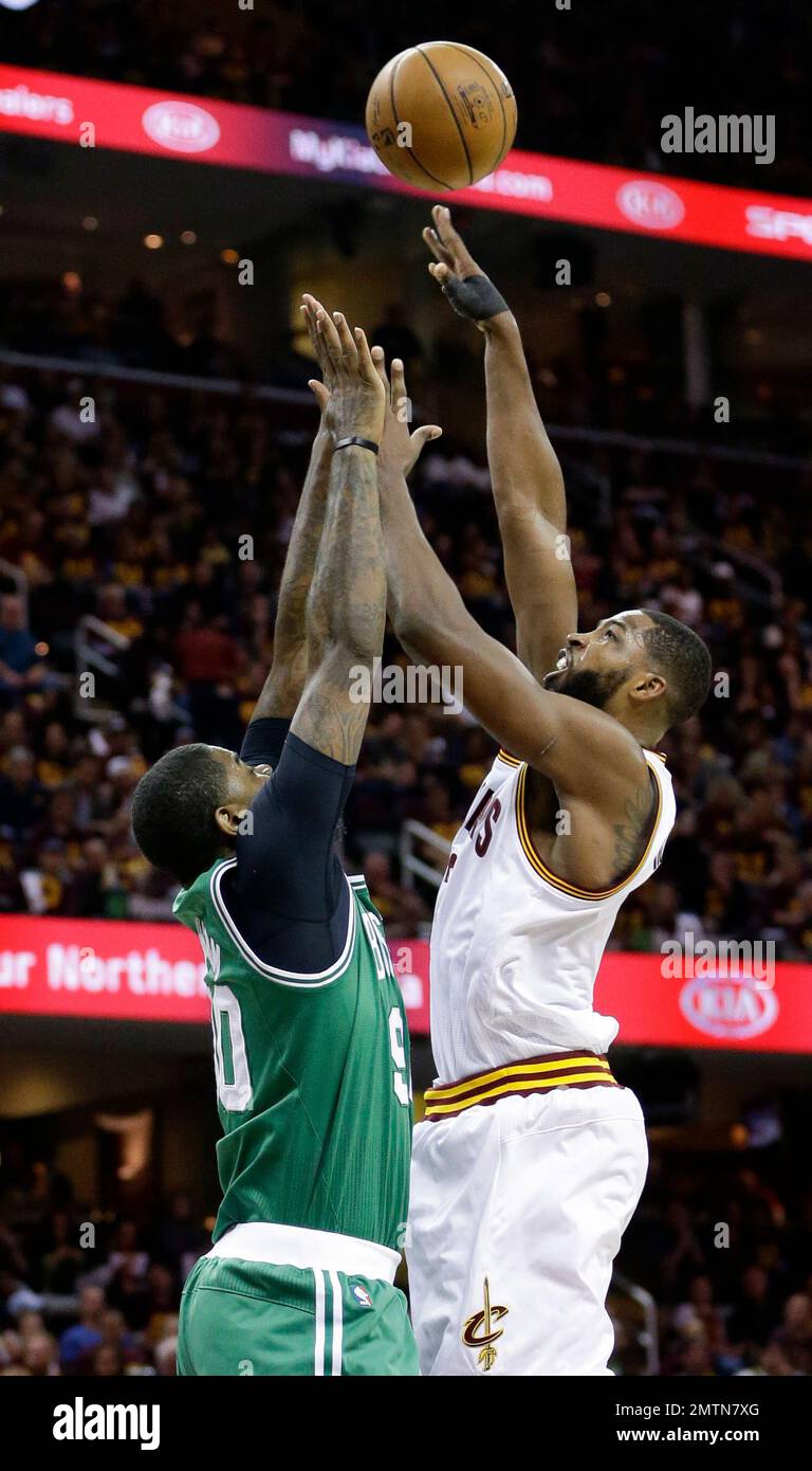 Cleveland Cavaliers' Tristan Thompson (13) shoots over Boston Celtics ...