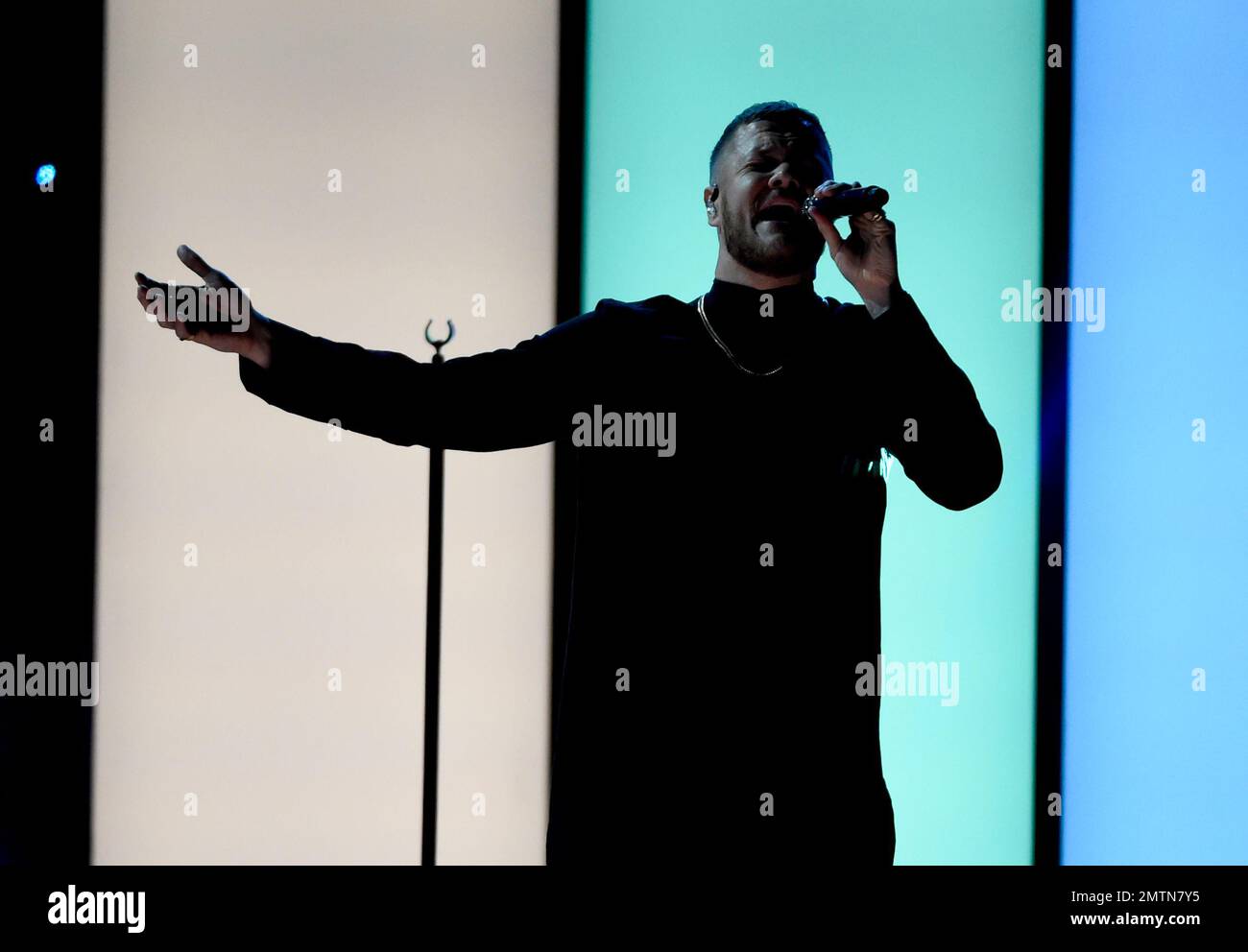 Dan Reynolds of Imagine Dragons performs "Believer" at the Billboard ...