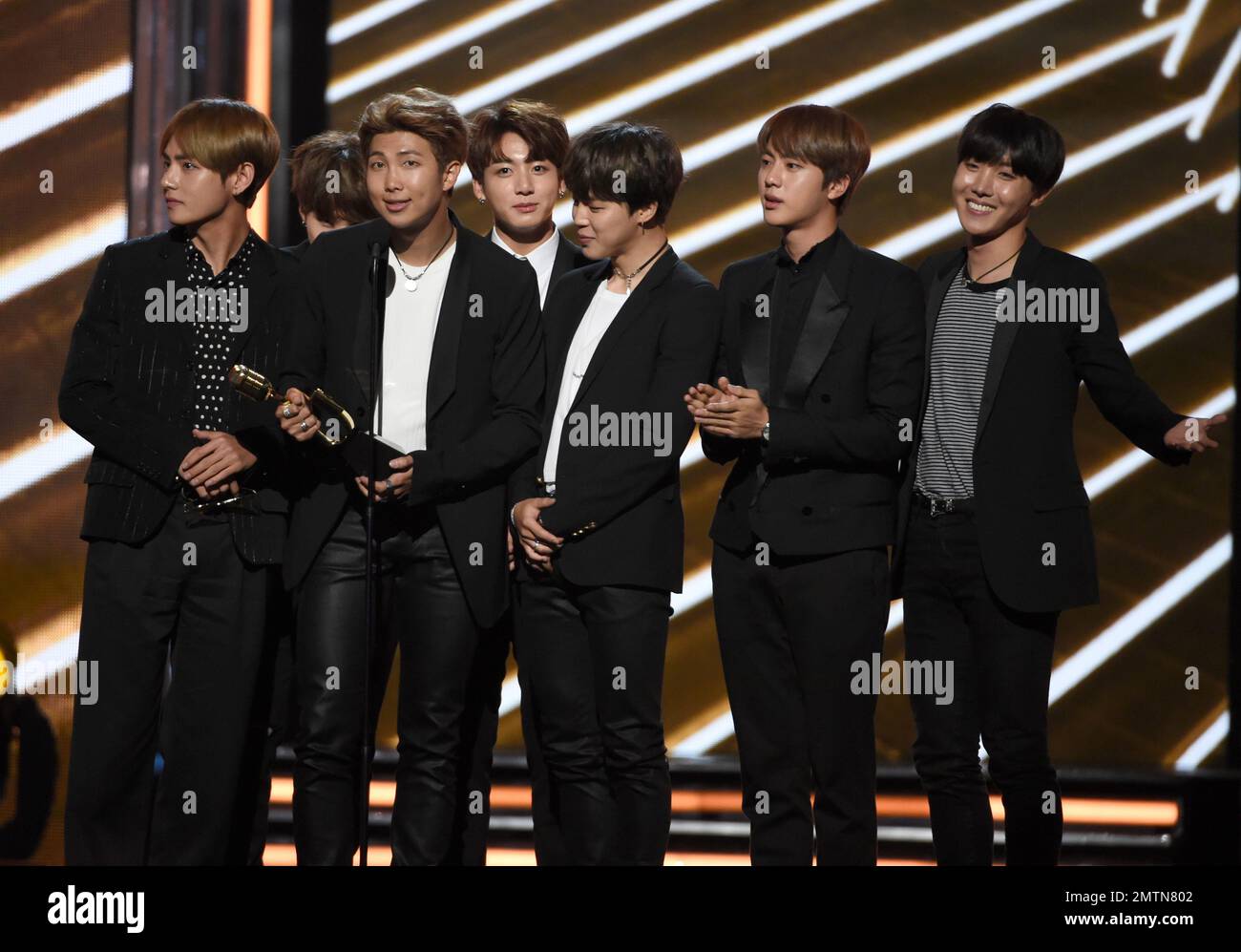 BTS, a South Korean band, accepts the award for top social artist at ...