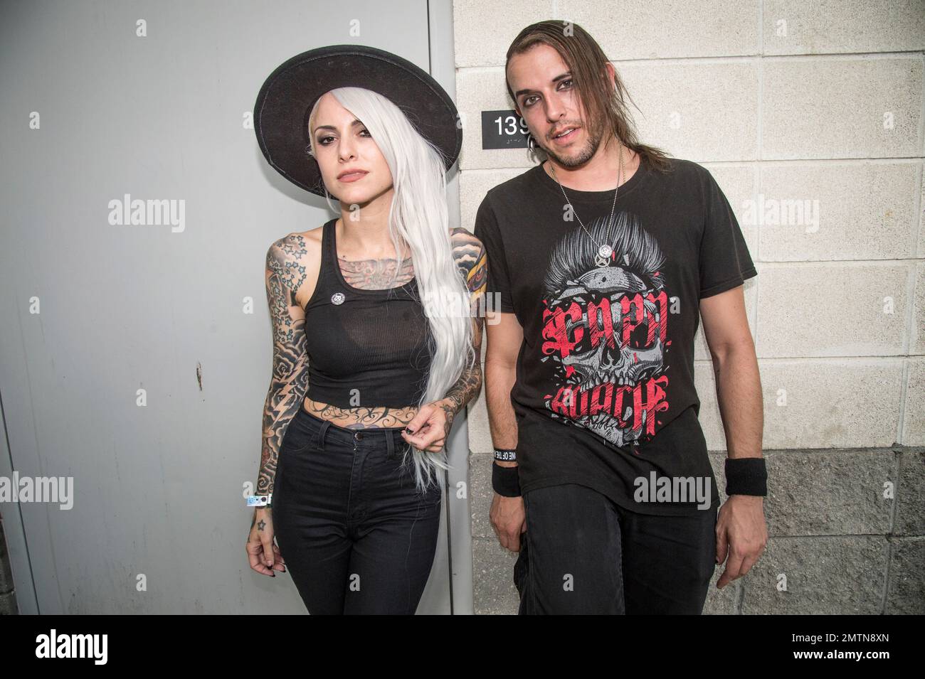 Alecia 'Mixi' Demner, left, and James Decker of Stitched Up Heart pose ...