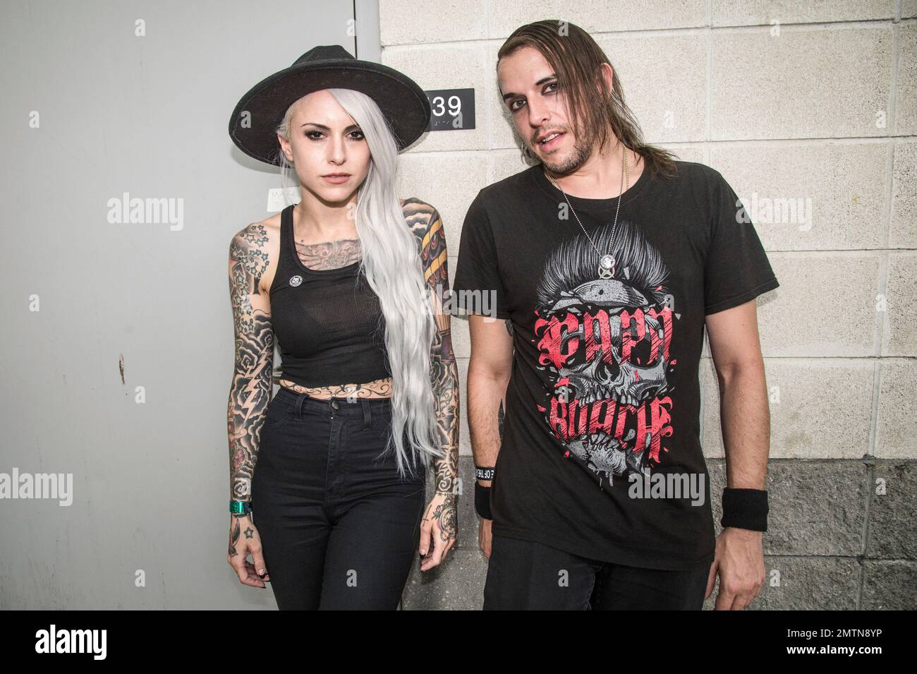 Alecia 'Mixi' Demner, left, and James Decker of Stitched Up Heart pose ...