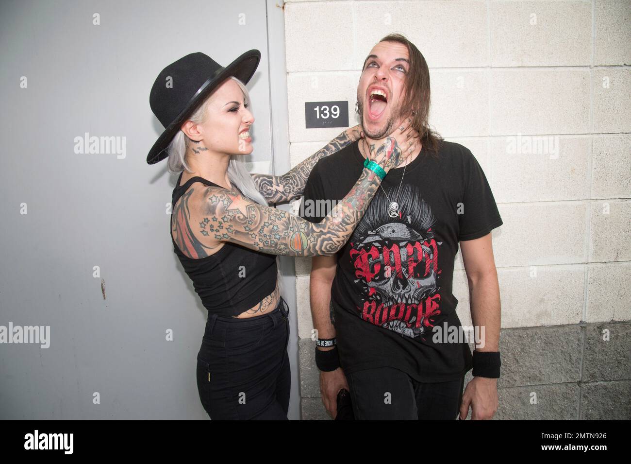 Alecia 'Mixi' Demner, left, and James Decker of Stitched Up Heart pose ...