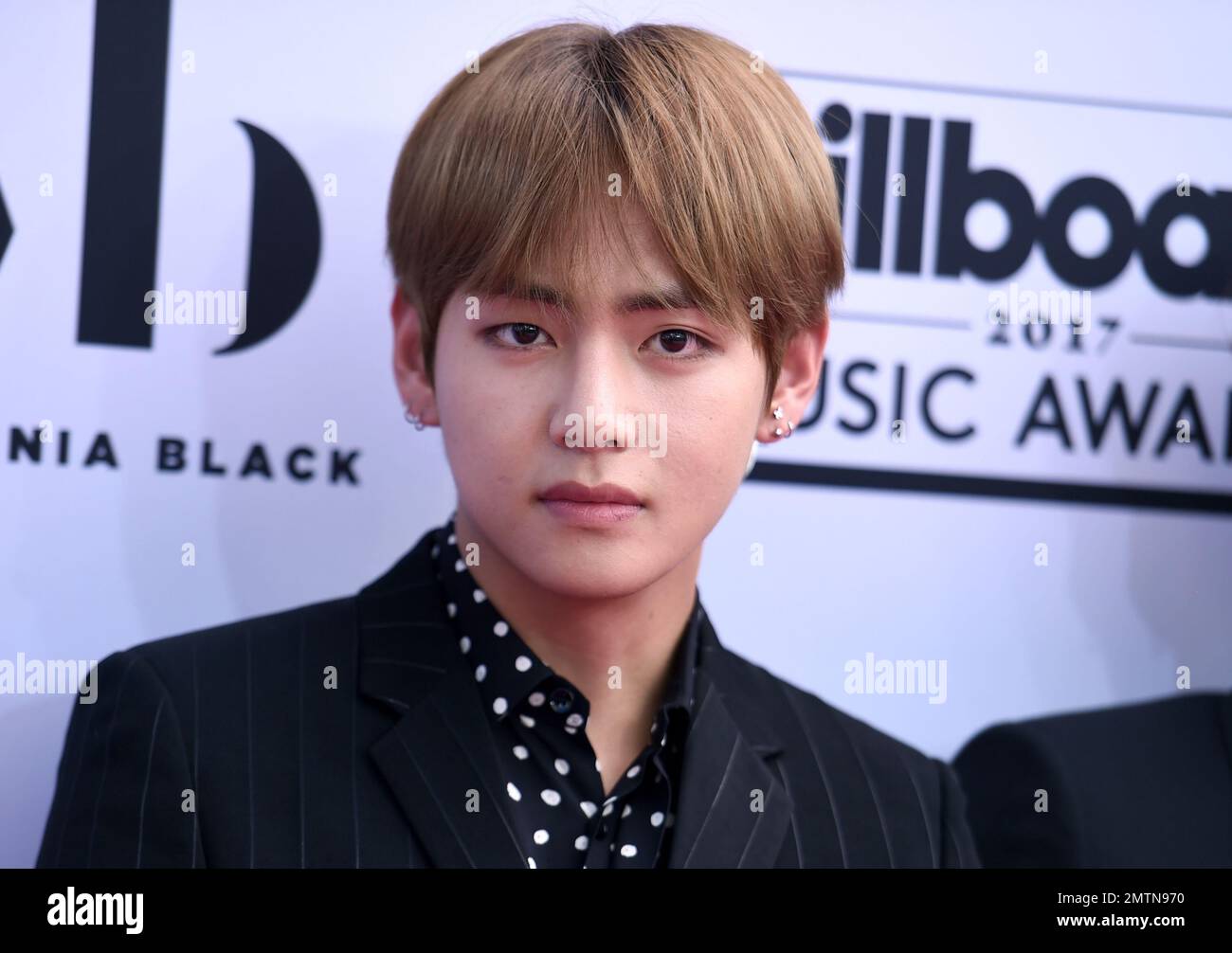 V, of BTS, arrives at the Billboard Music Awards at the T-Mobile Arena ...