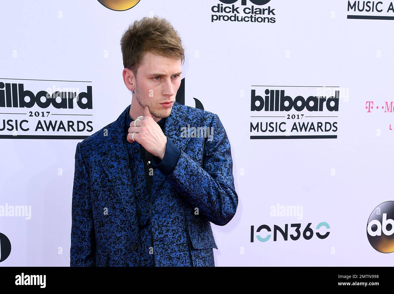 Machine Gun Kelly arrives at the Billboard Music Awards at the T-Mobile ...