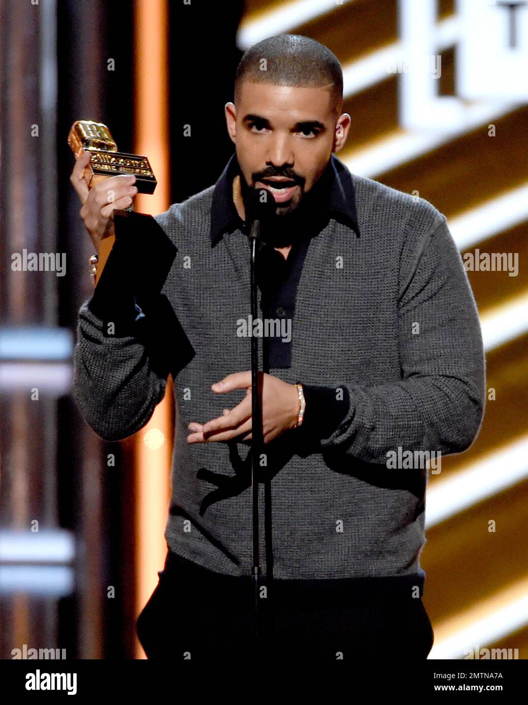 Drake accepts the award for top male artist at the Billboard Music ...