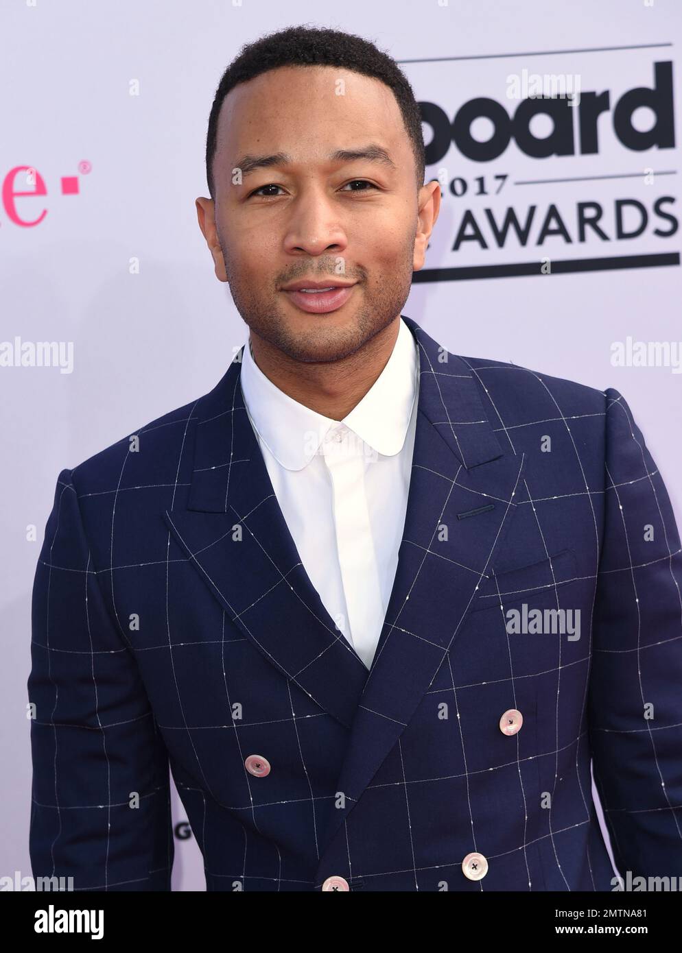 John Legend arrives at the Billboard Music Awards at the T-Mobile Arena ...