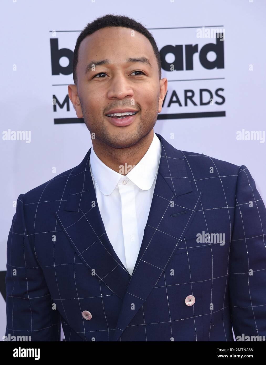John Legend arrives at the Billboard Music Awards at the T-Mobile Arena ...