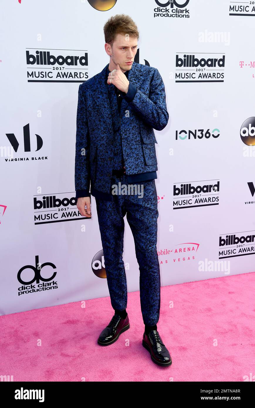 Machine Gun Kelly arrives at the Billboard Music Awards at the T-Mobile ...