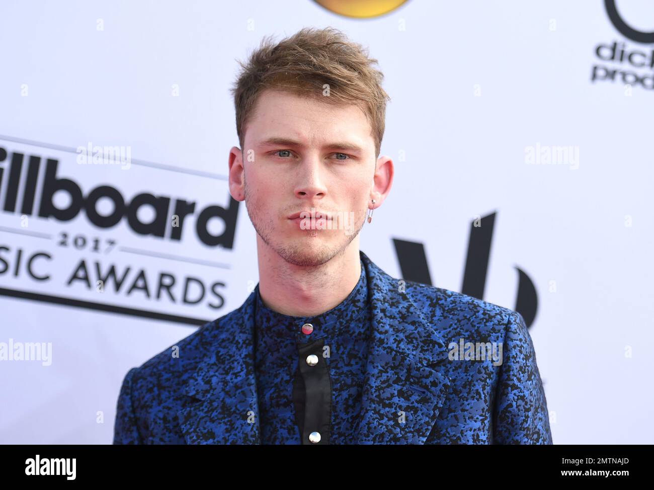 Machine Gun Kelly arrives at the Billboard Music Awards at the T-Mobile ...