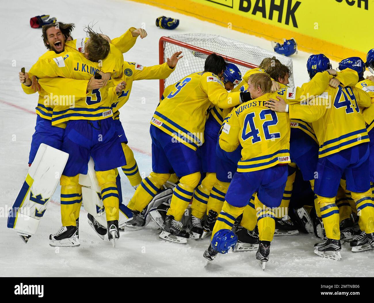 Sweden players celebrate after winning the gold medal at the Ice Hockey World Championships ...