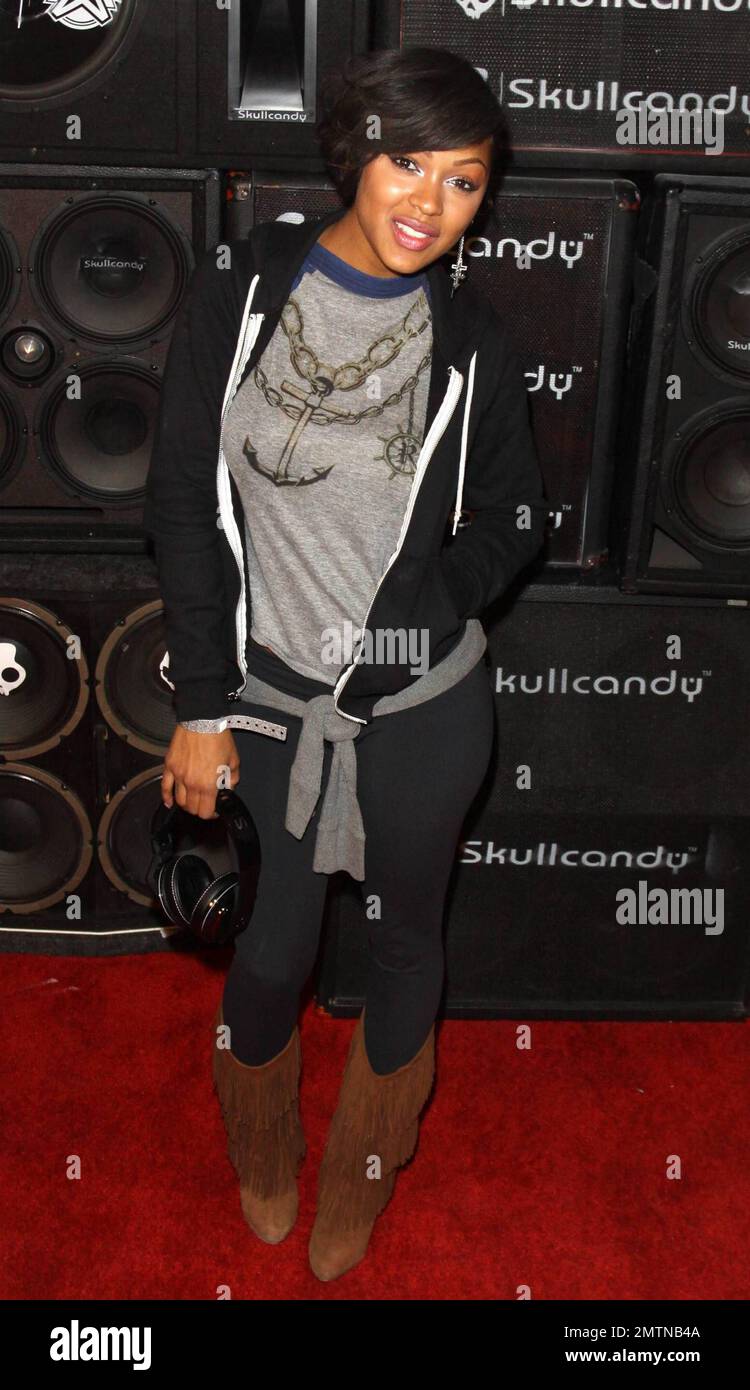 Meagan Good poses on the red carpet at My House during the launch of ...