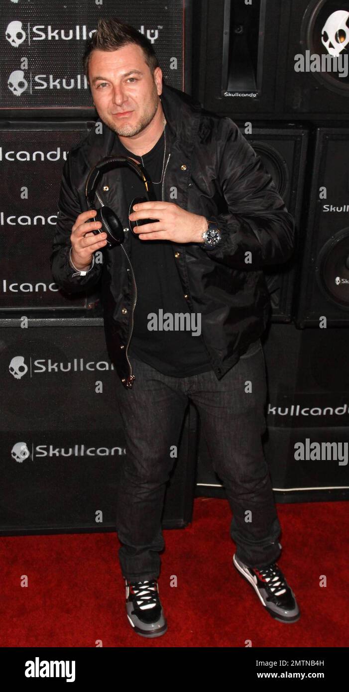 DJ Lethal poses on the red carpet at My House during the launch of ...