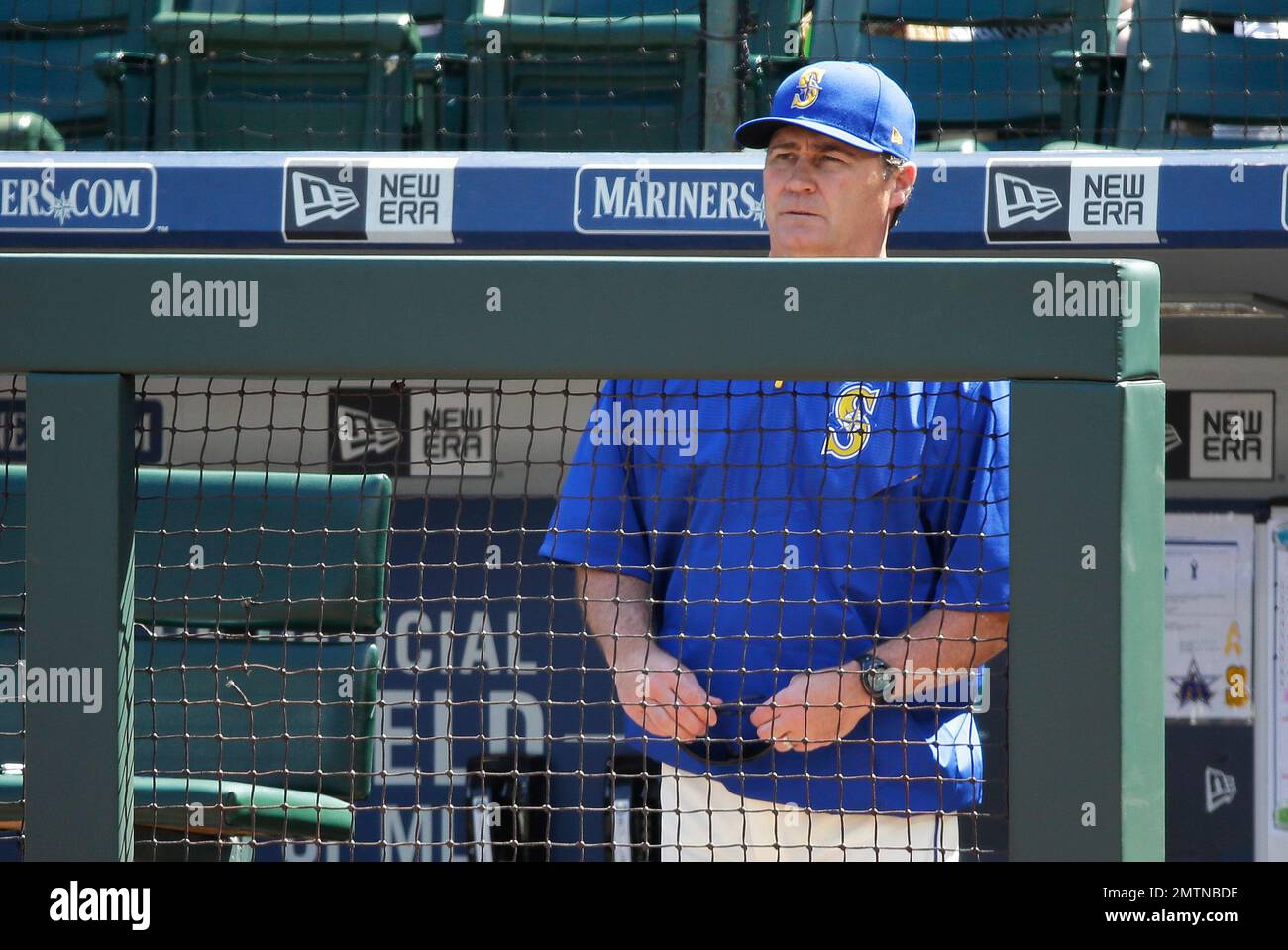 Seattle Mariners manager Scott Servais watches from the dugout after ...