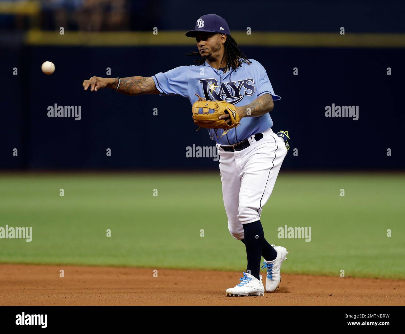 Tampa Bay Rays second baseman Michael Martinez throws out New York ...