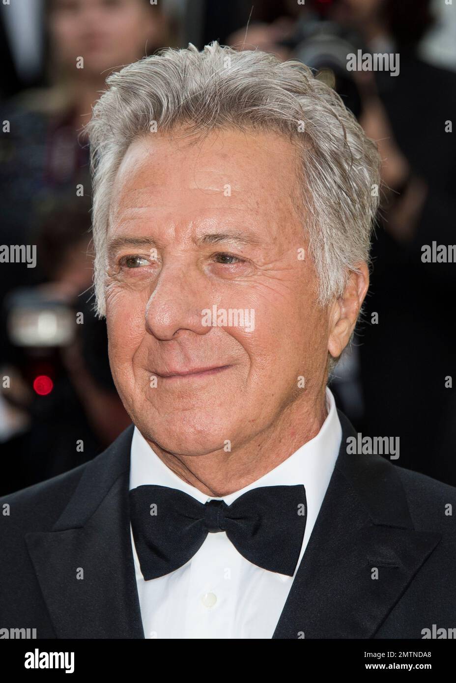 Dustin Hoffman poses for photographers upon arrival at the screening of ...