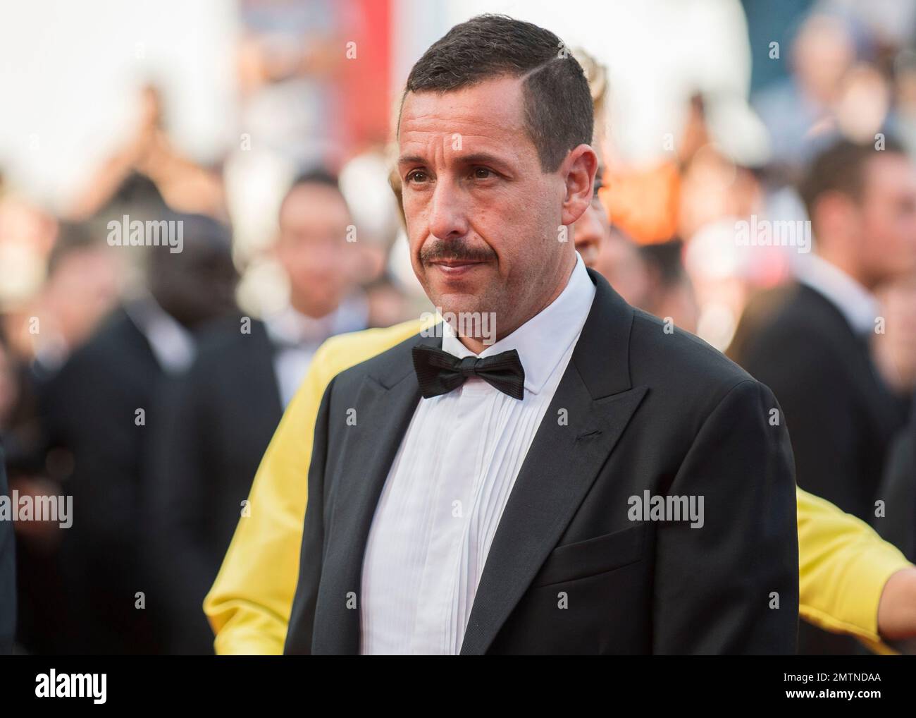 Adam Sandler poses for photographers upon arrival at the screening of ...