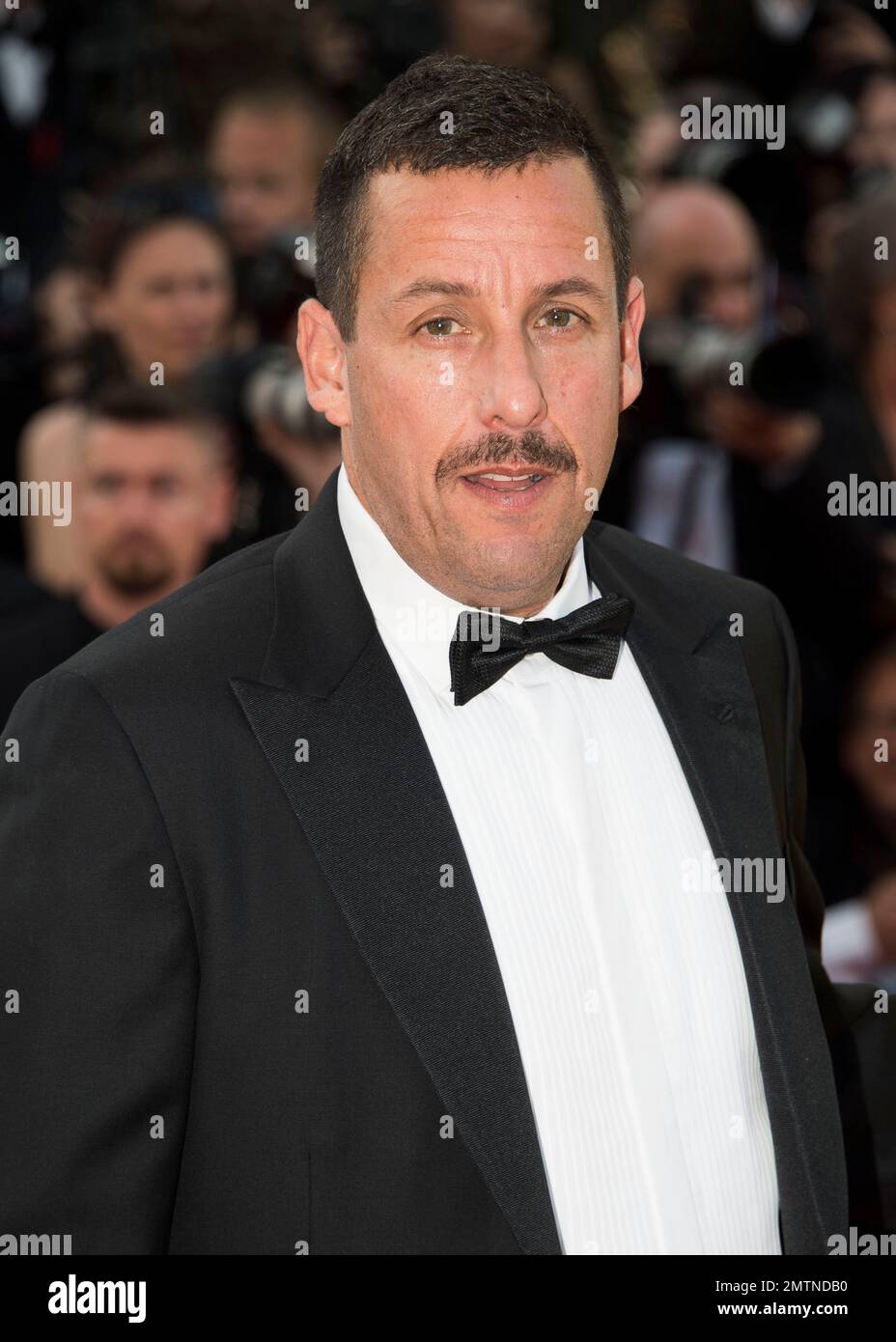 Adam Sandler poses for photographers upon arrival at the screening of ...