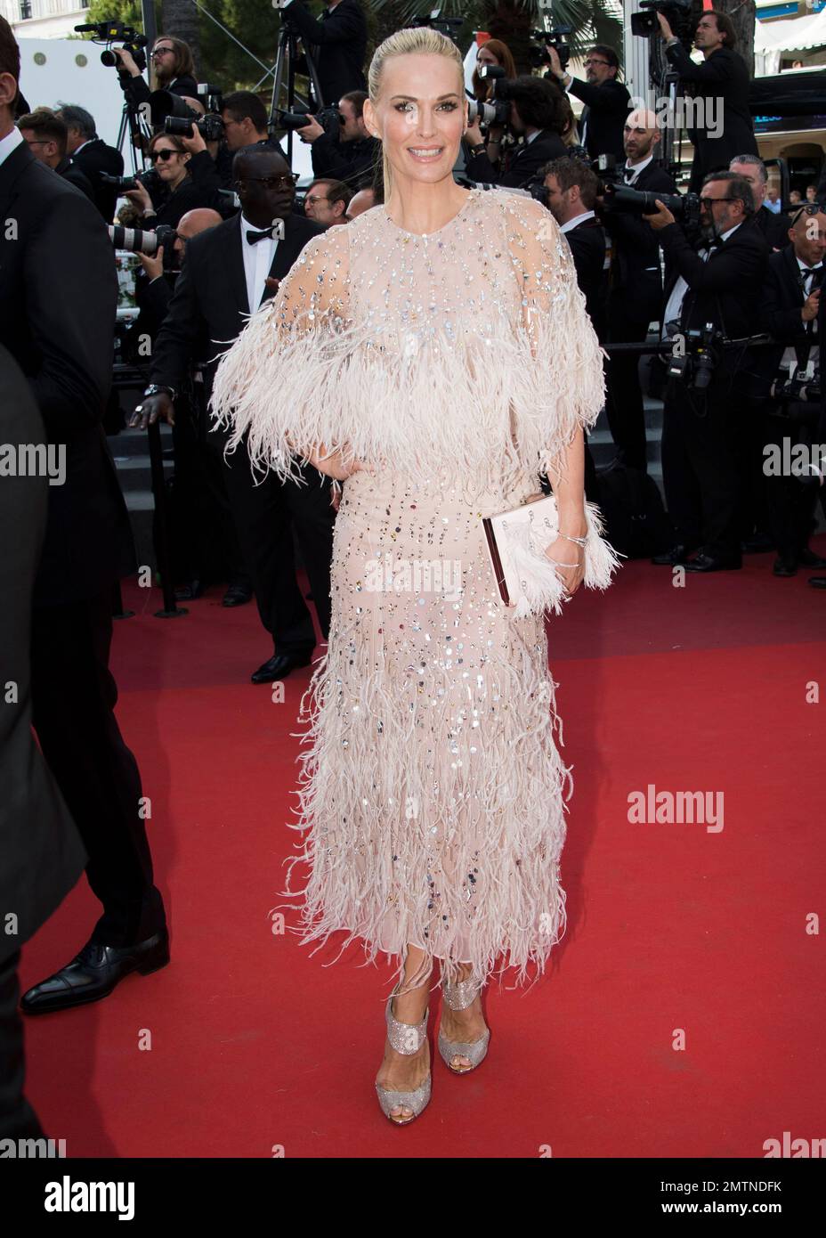 Molly Sims poses for photographers upon arrival at the screening of the ...