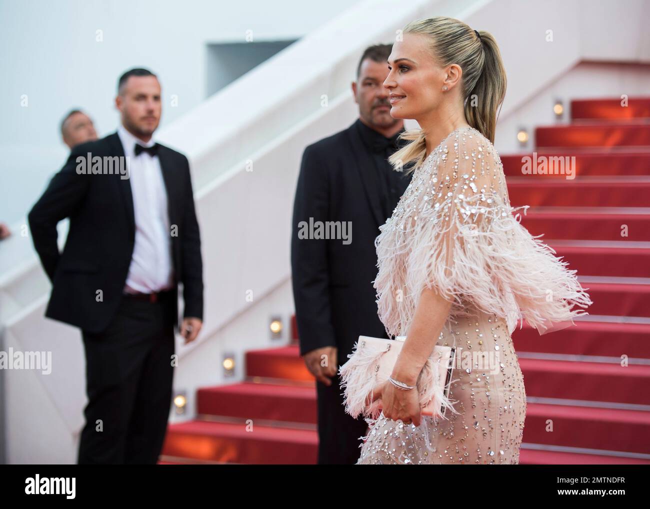 Molly Sims poses for photographers upon arrival at the screening of the ...