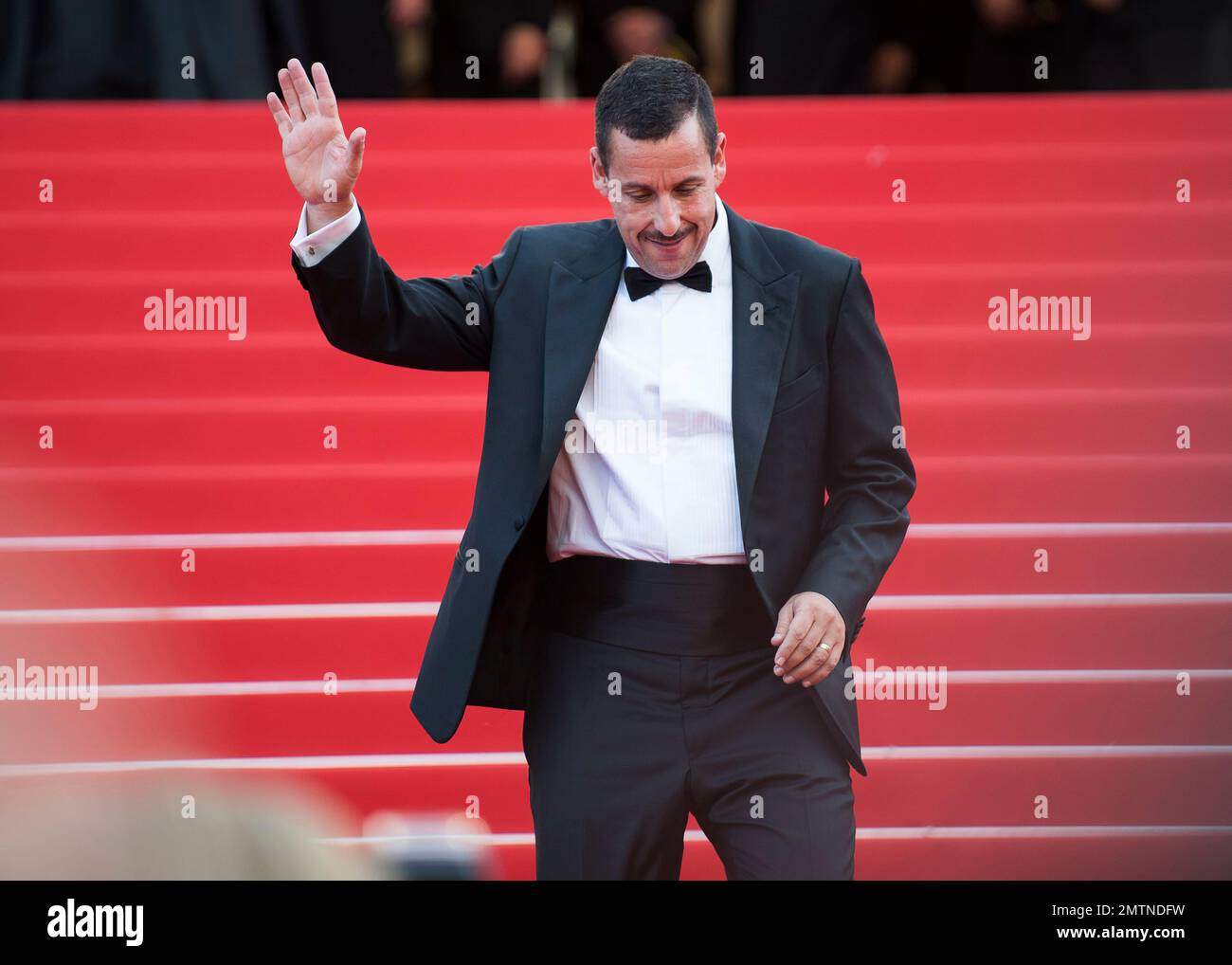 Adam Sandler poses for photographers upon arrival at the screening of ...