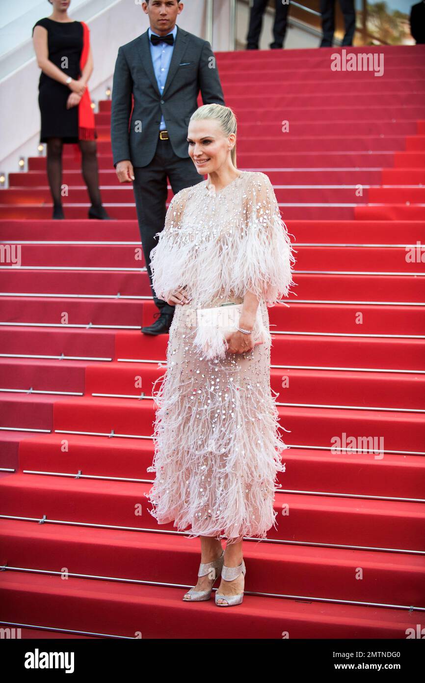 Molly Sims poses for photographers upon arrival at the screening of the ...