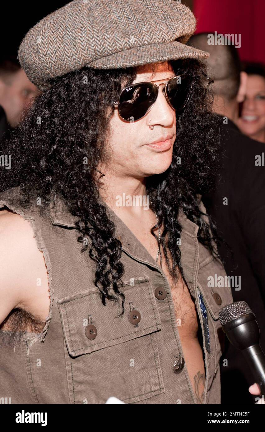 Legendary musician Slash (aka Saul Hudson) shows off his tattoos in a ...