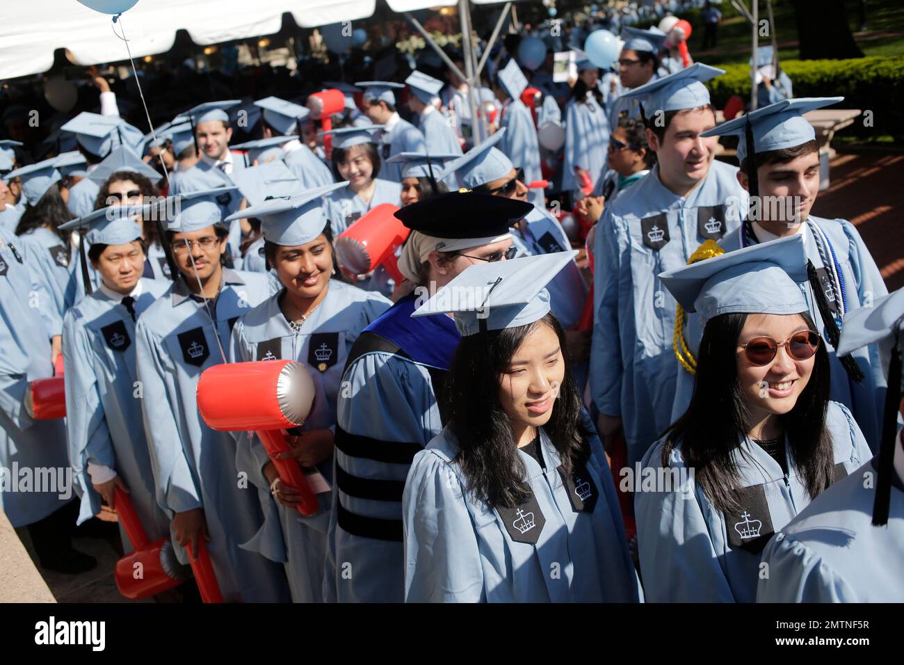Students participate in a graduation ceremony at Columbia University in ...