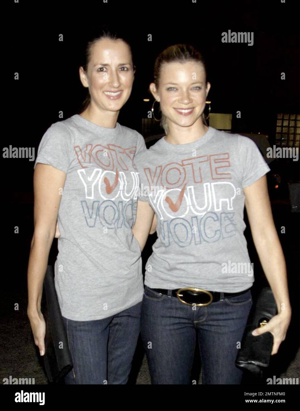 Amy Smart and Anne Getty wear matching t shirts that say "Vote Your ...
