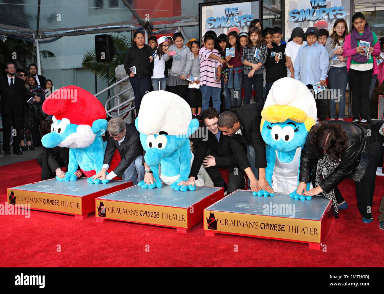 Papa Smurf, Bob Osher, Clumsy, Smurfette and Anton Yelchin at The ...