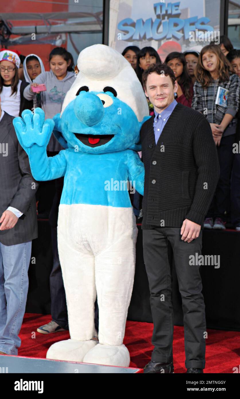 Clumsy and Anton Yelchin at The Smurfs handprint and footprint ceremony ...