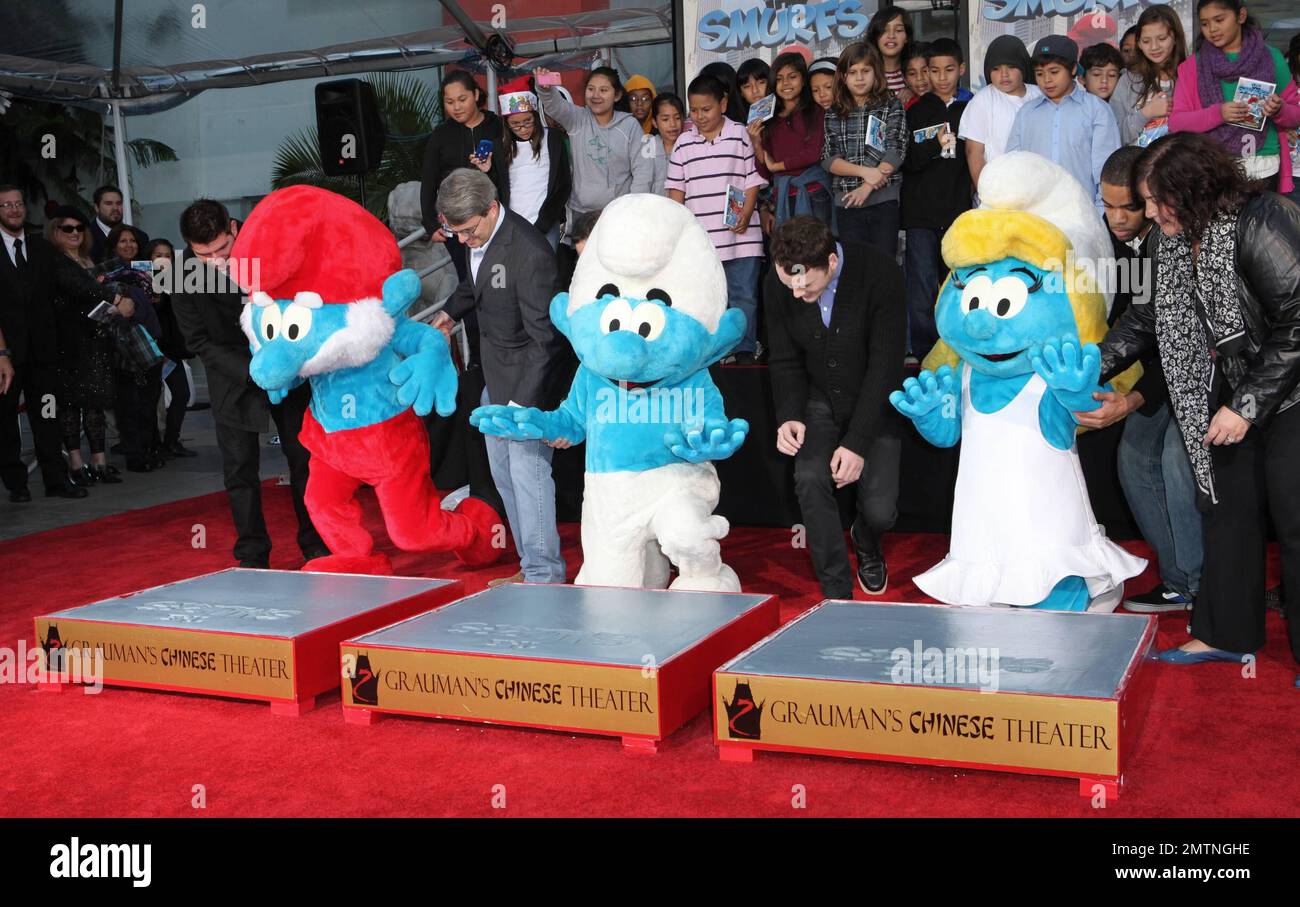 Papa Smurf, Bob Osher, Clumsy, Smurfette and Anton Yelchin at The ...