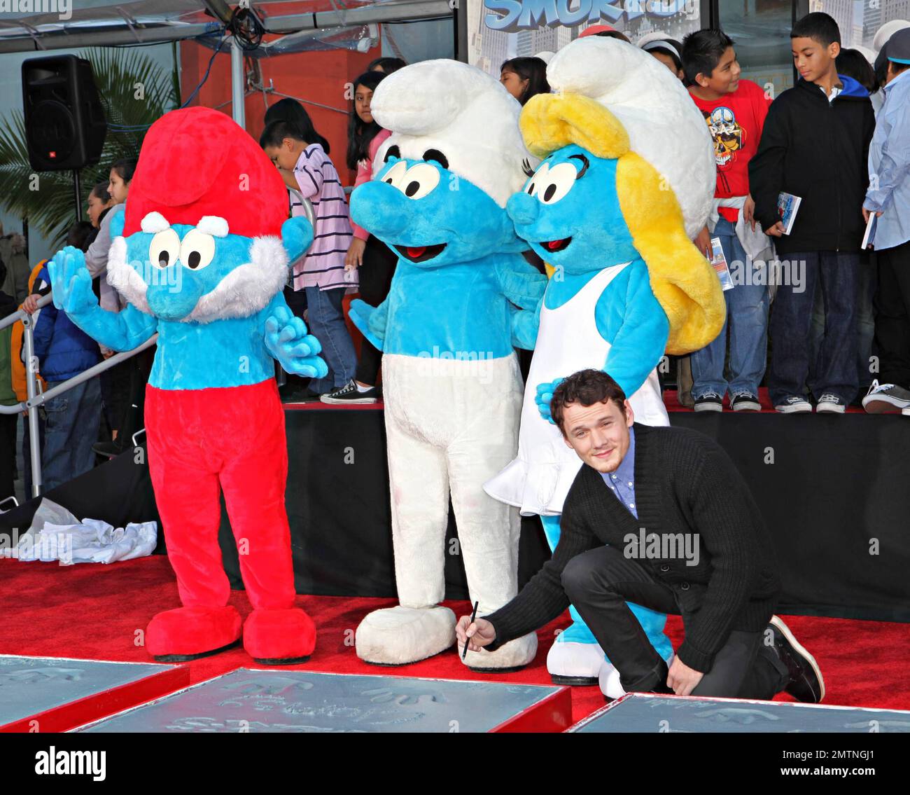 Papa Smurf, Clumsy, Smurfette and Anton Yelchin at The Smurfs handprint ...