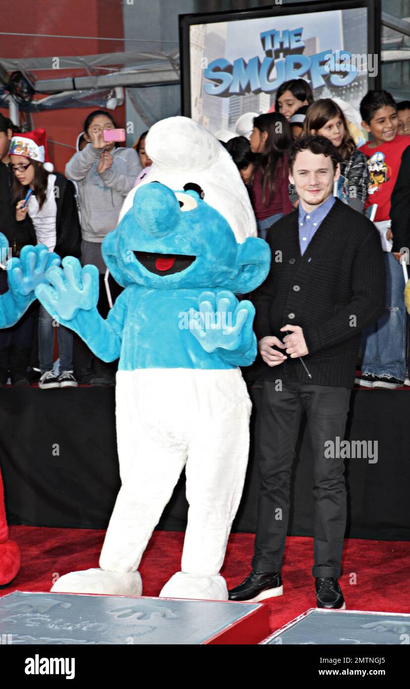 Clumsy and Anton Yelchin at The Smurfs handprint and footprint ceremony ...