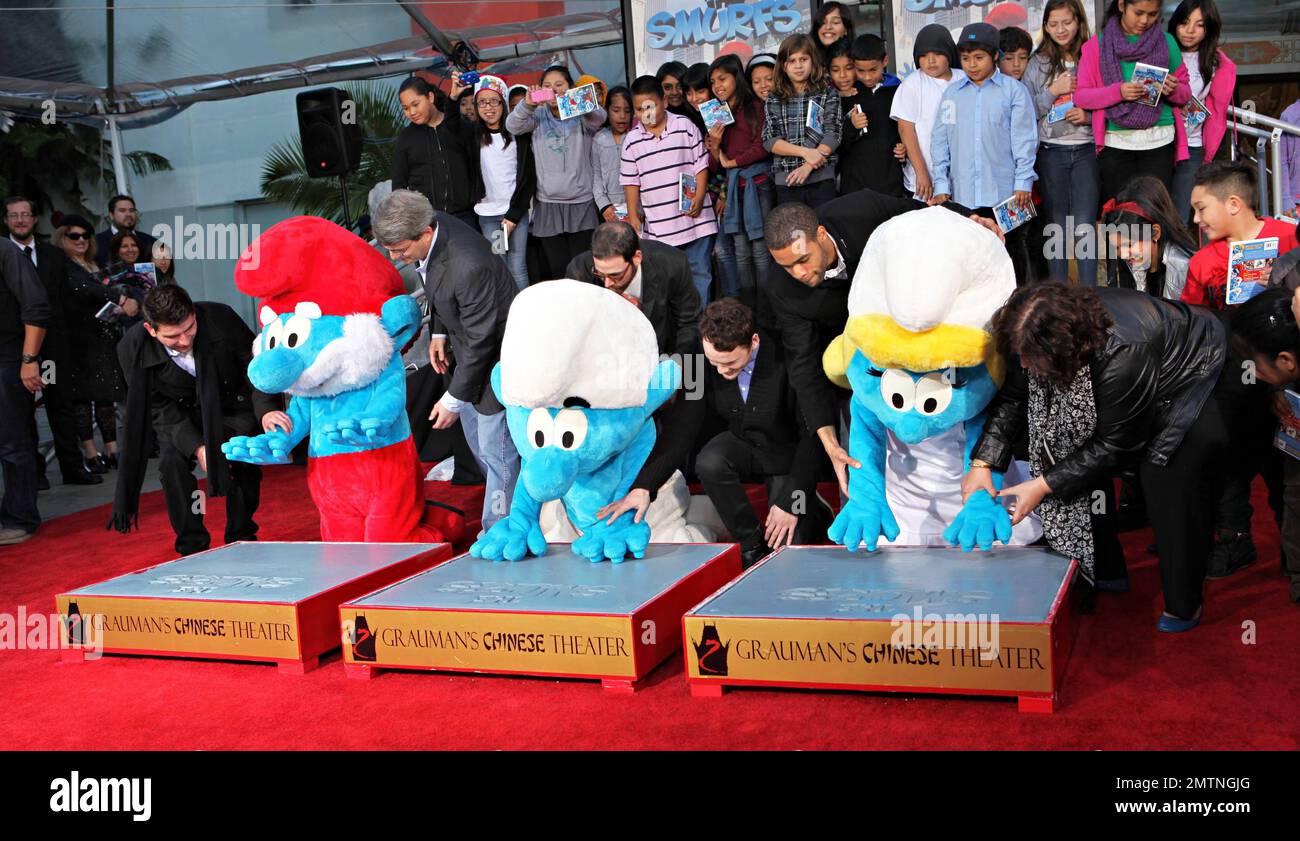Papa Smurf, Bob Osher, Clumsy, Smurfette and Anton Yelchin at The ...