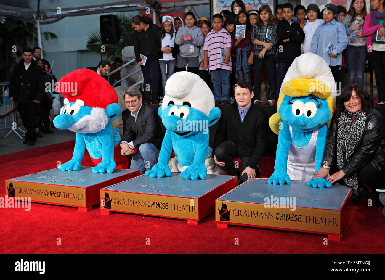 Papa Smurf, Bob Osher, Clumsy, Smurfette and Anton Yelchin at The ...