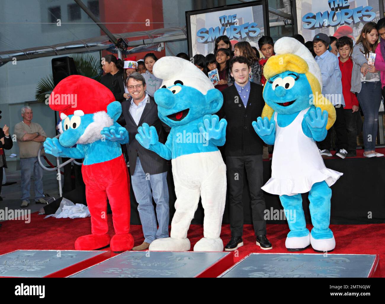 Papa Smurf, Bob Osher, Clumsy, Smurfette and Anton Yelchin at The ...