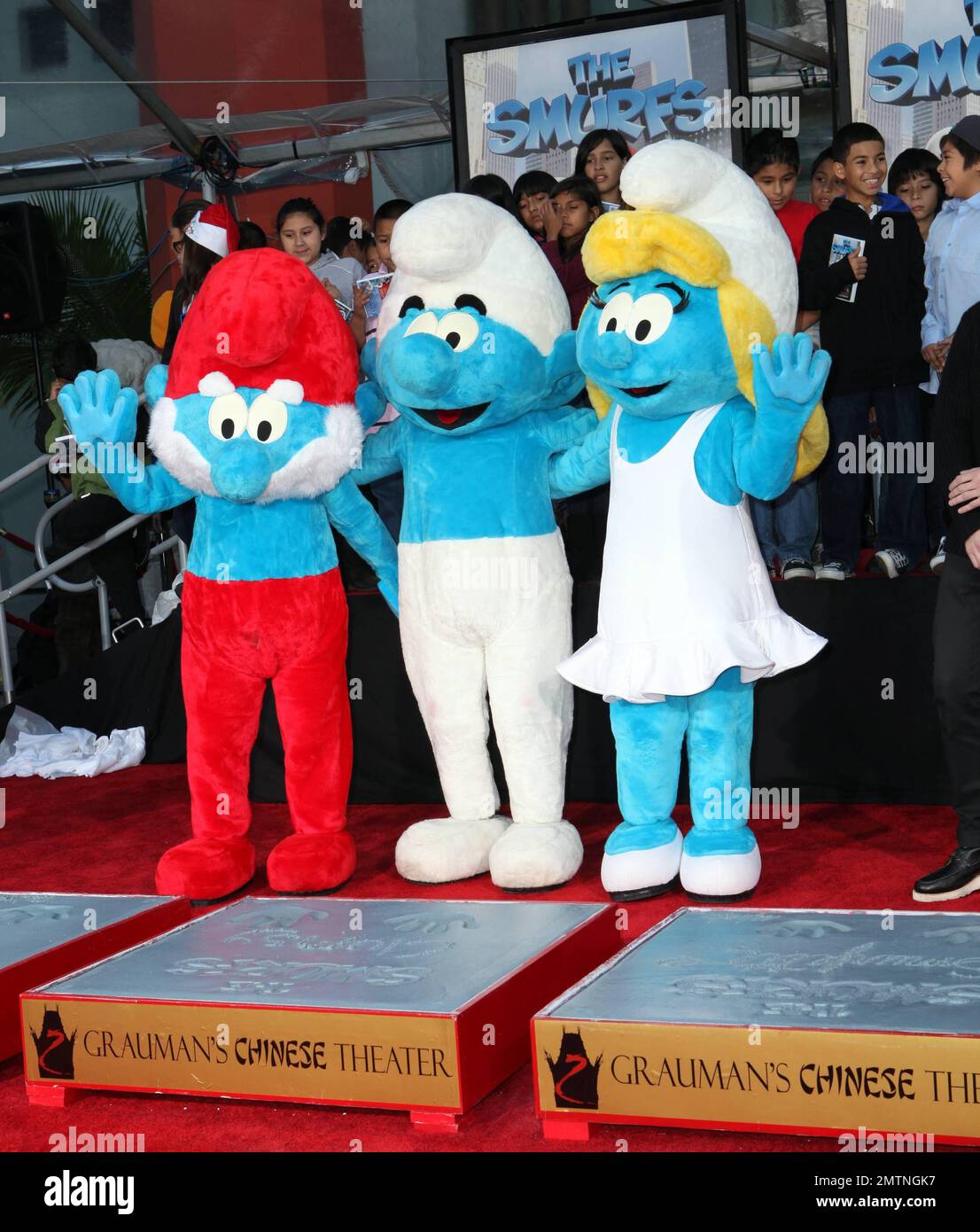 Papa Smurf, Clumsy and Smurfette at The Smurfs handprint and footprint ...