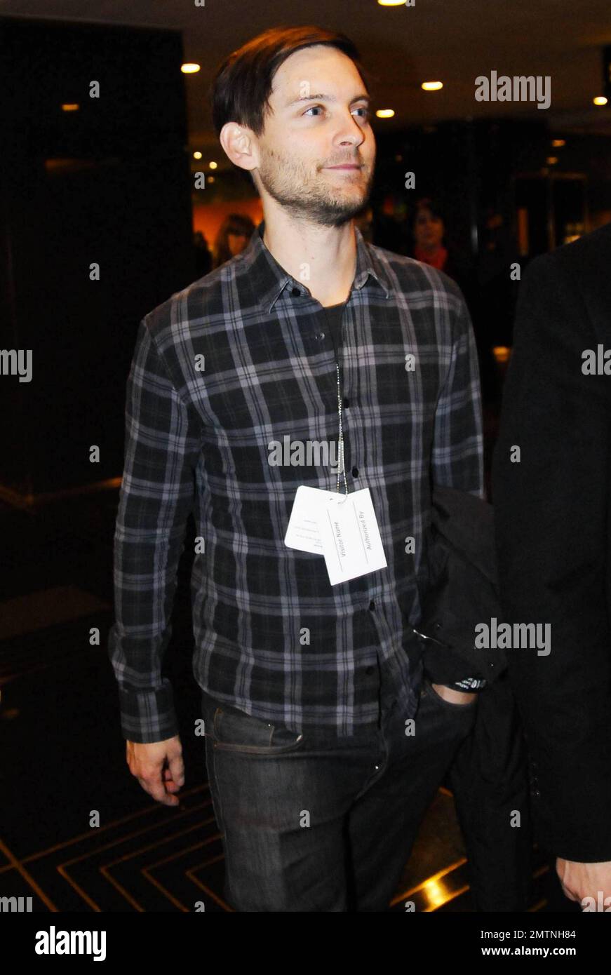 Tobey Maguire shows off his side-slicked hairdo at 30 Rockefeller Plaza ...
