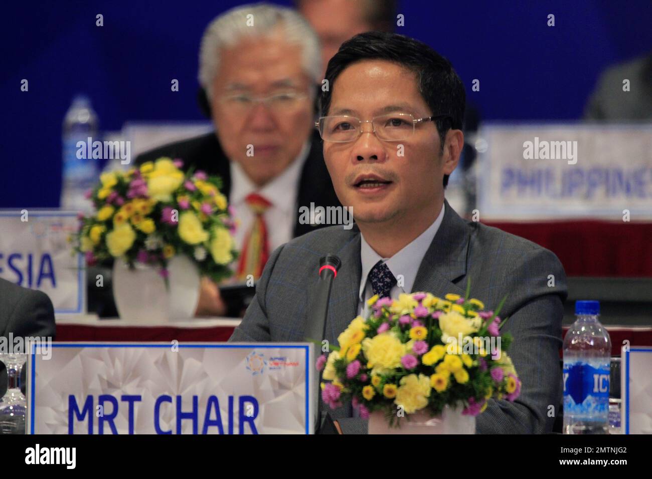 Vietnamese Trade Minister Tran Tuan Anh speaks during a press conference after the Asia-Pacific ...