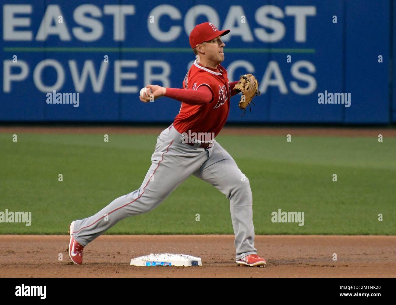 Los Angeles Angels second baseman Cliff Pennington throws to first ...