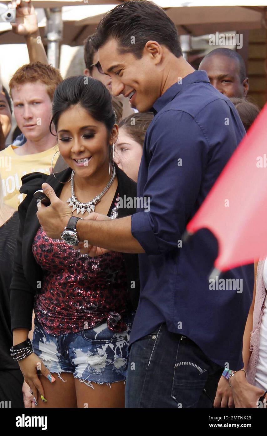 Wearing a typical outlandish Jersey-style outfit, "Jersey Shore" star ...